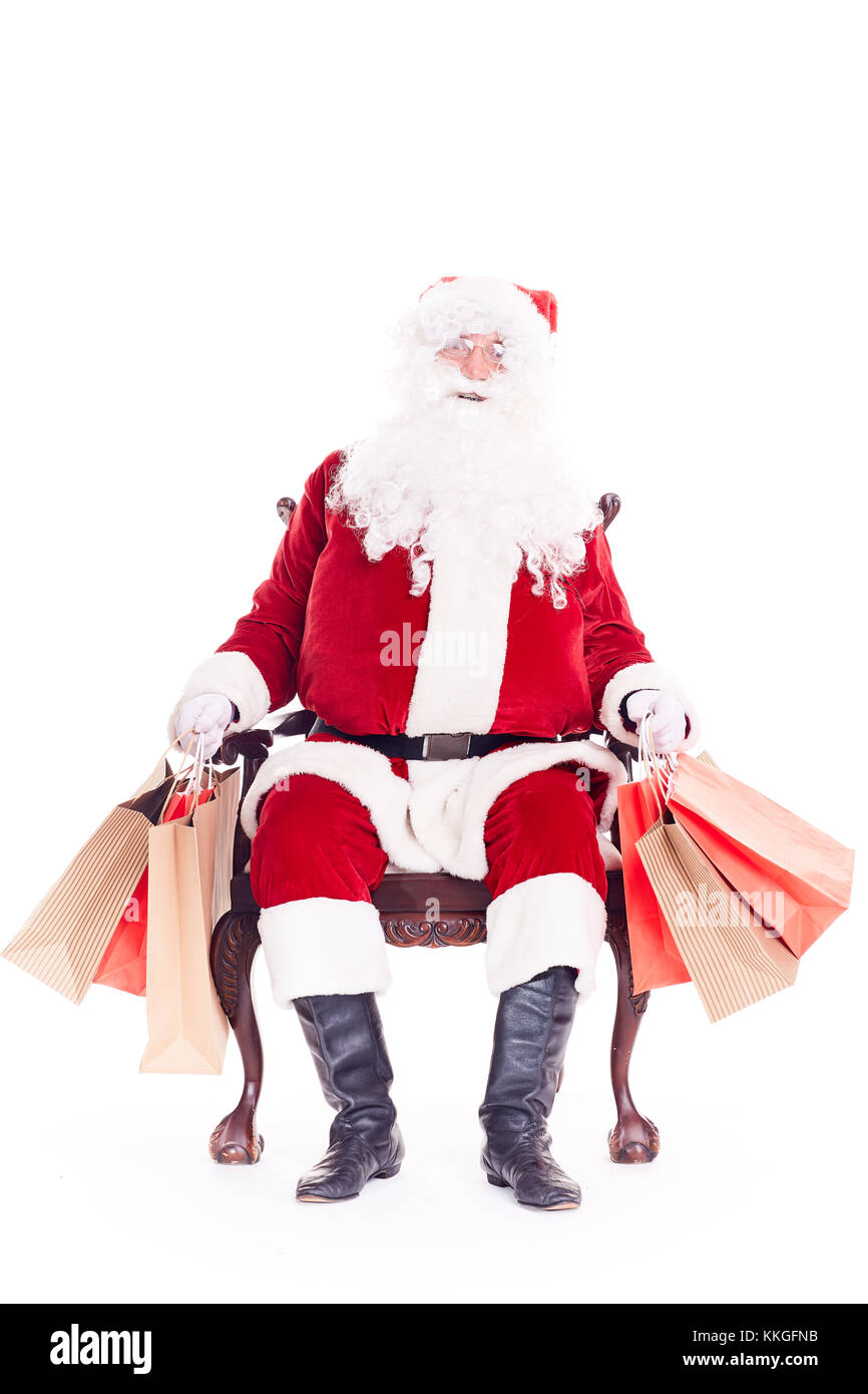 Santa after Christmas shopping Stock Photo - Alamy