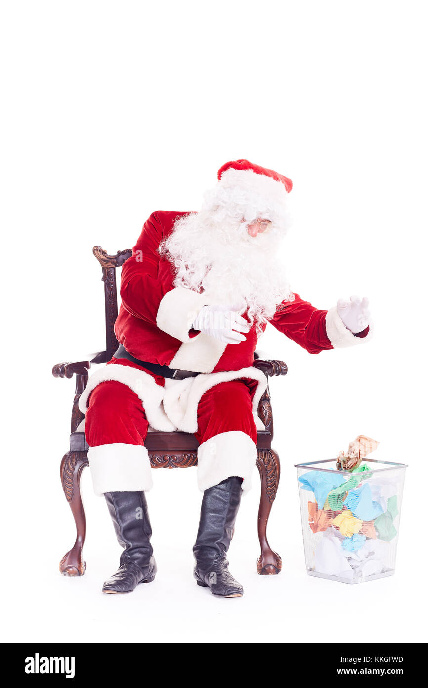 Bad Santa reading letters Stock Photo - Alamy