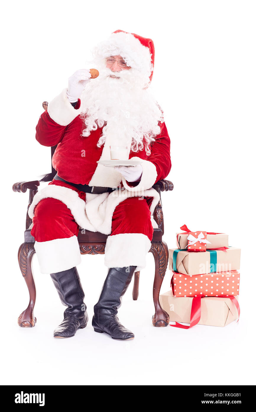 Santa eating cookies hi-res stock photography and images - Alamy