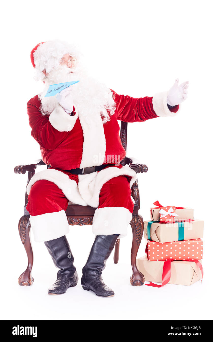 Santa launching paper airplane Stock Photo - Alamy