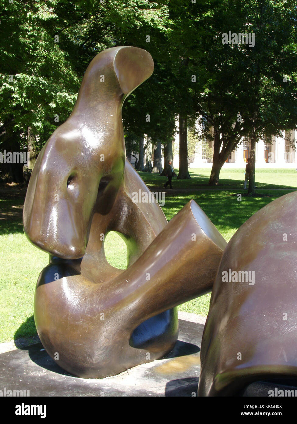 This image features a detail of Henry Moore's *Three Piece Reclining ...