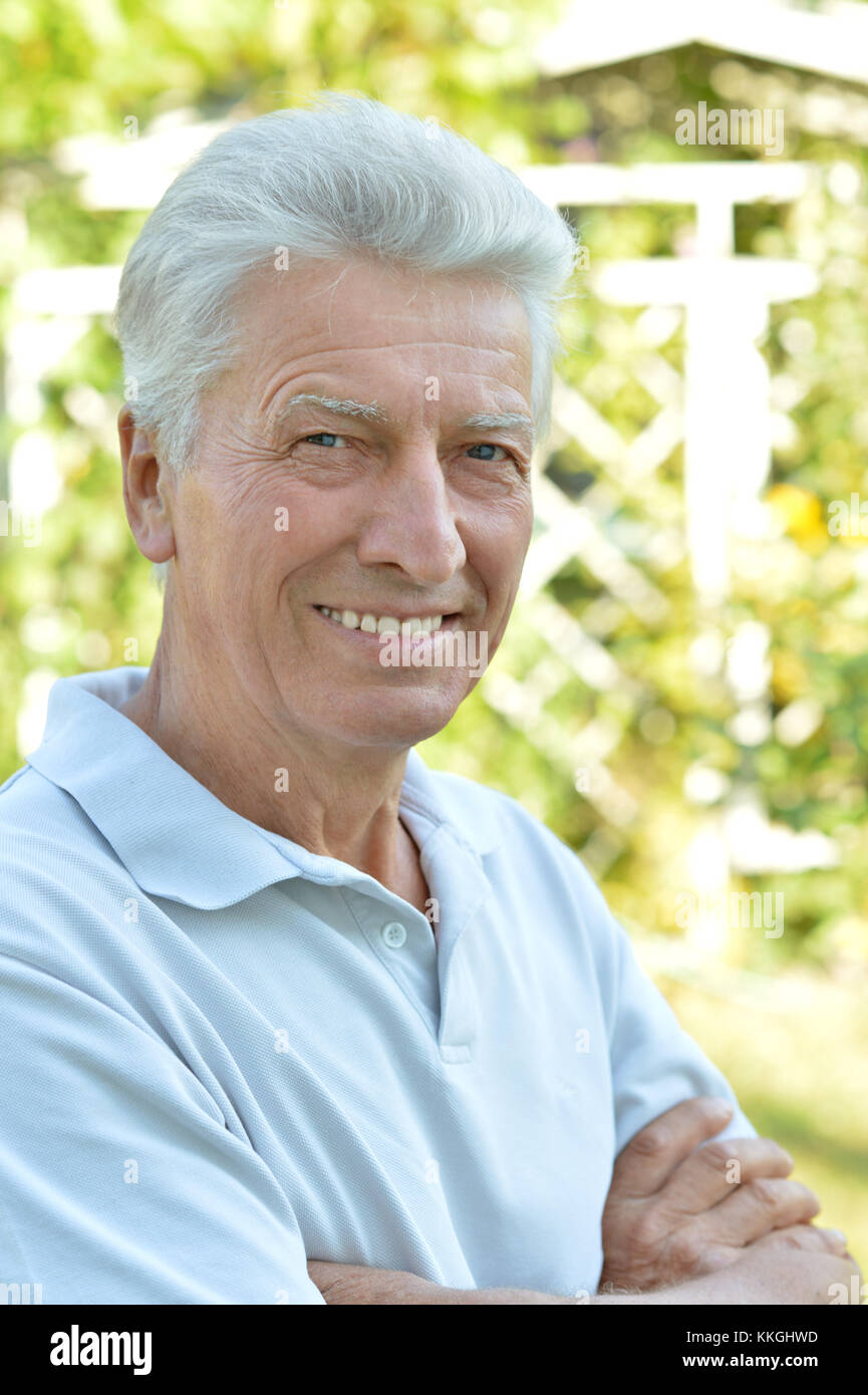 Smiling elderly man Stock Photo - Alamy