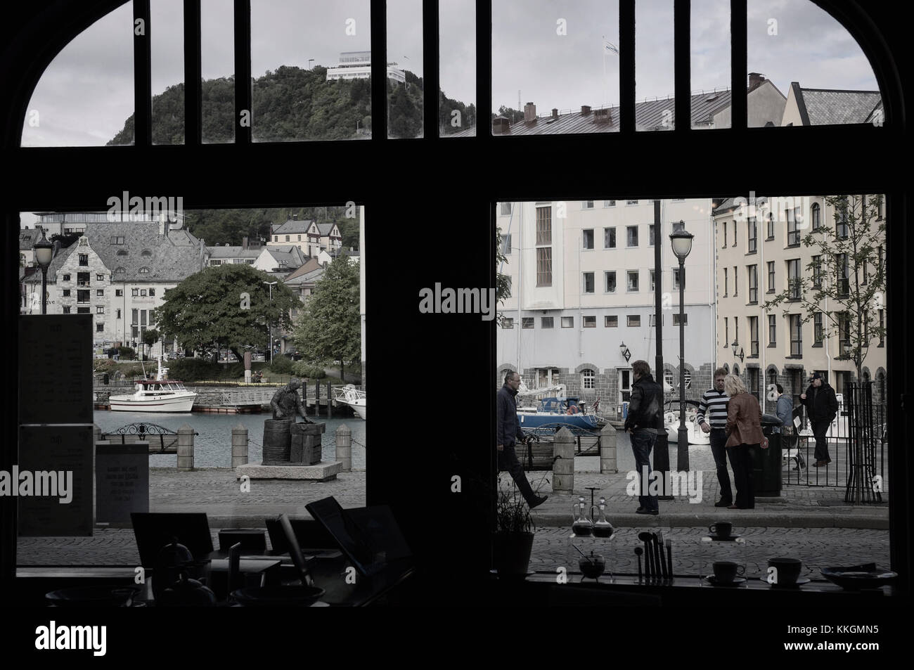 Alesund harbour and the fish woman statue viewed from the ...