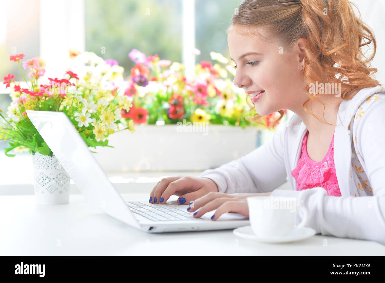 girl using laptop Stock Photo - Alamy