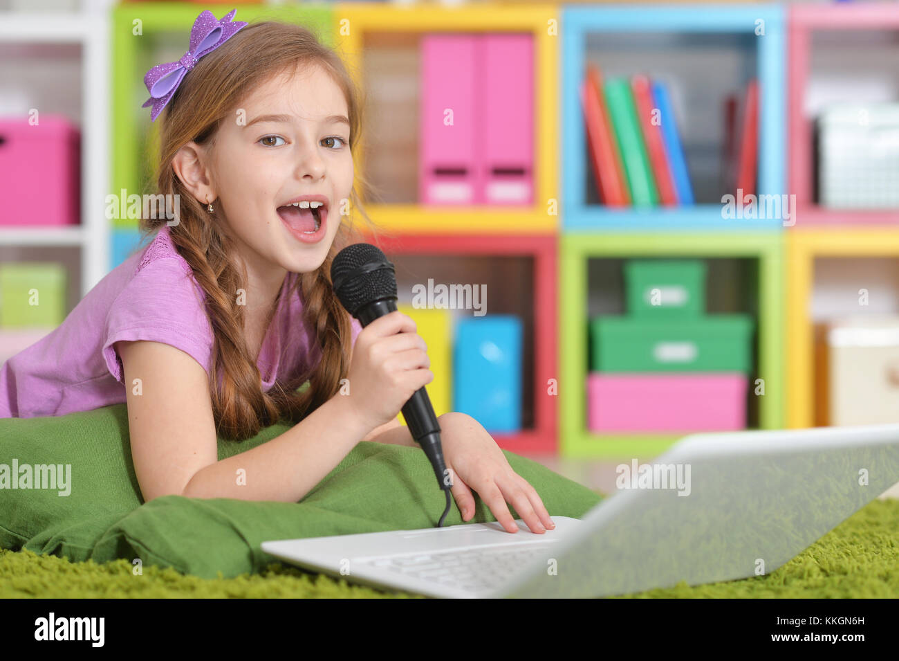 girl singing karaoke Stock Photo - Alamy