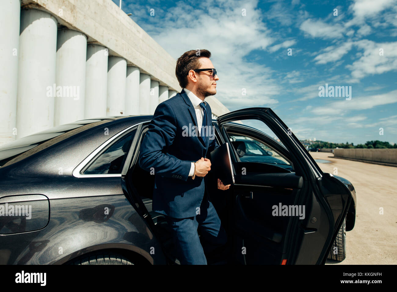 Man coming out of car hi-res stock photography and images - Alamy