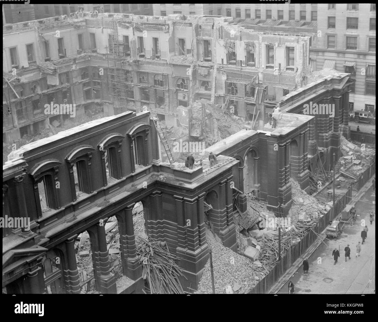 The image shows the demolition of a post office building in Boston in ...