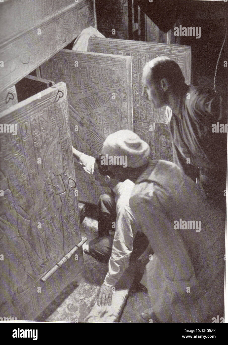 This image marks the historic moment when archaeologist Howard Carter ...