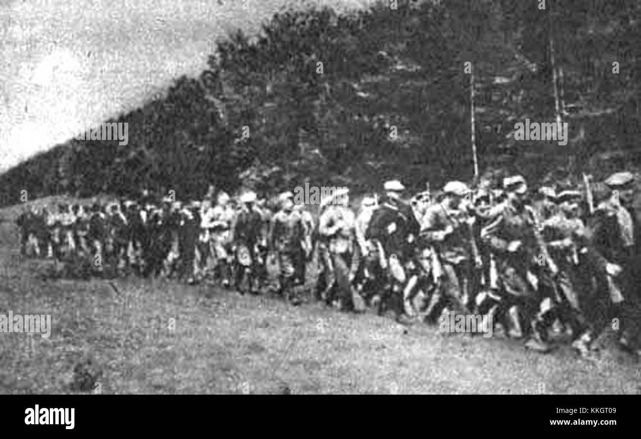 This photograph captures a moment from the Warsaw Uprising, a major ...