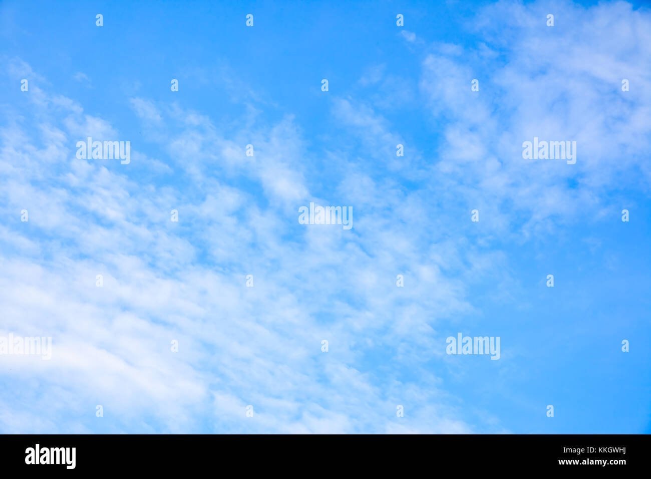 Light blue sky with clouds - abstract background Stock Photo - Alamy