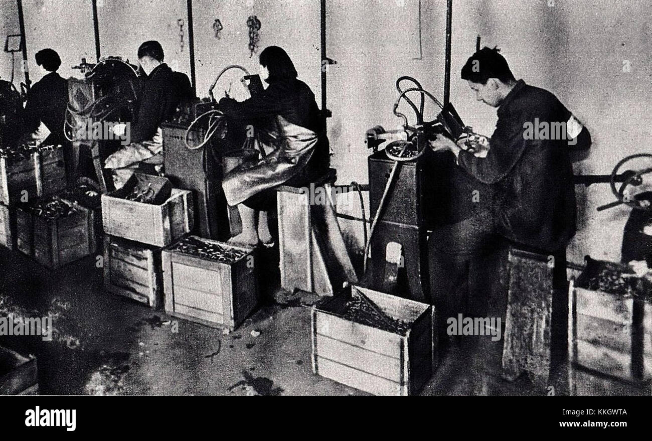 This historical image depicts Jewish workers in the Warsaw Ghetto ...