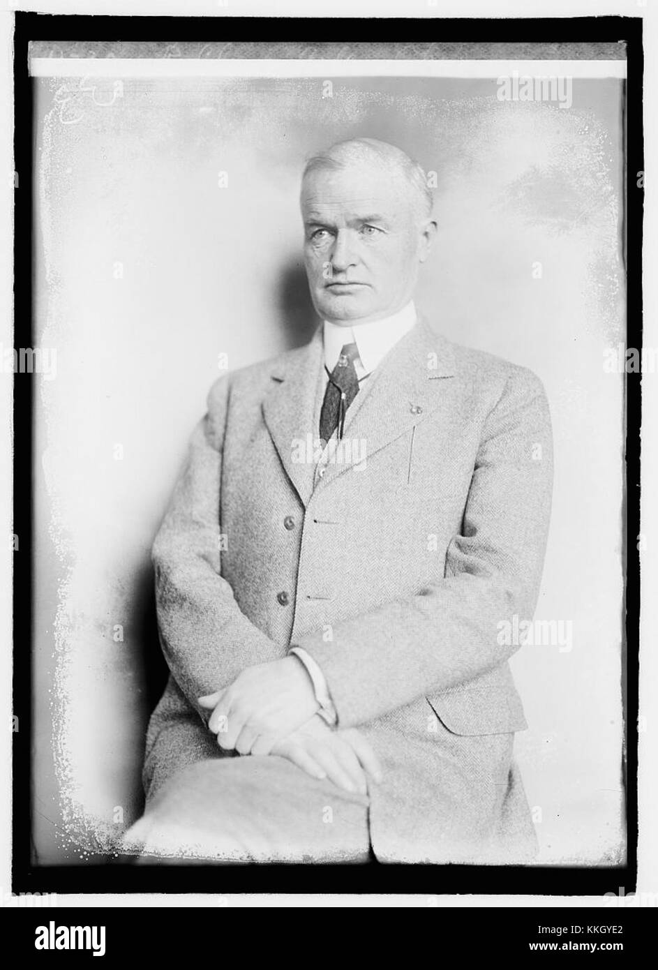 R. Clint Cole is depicted seated and looking to his right in this ...