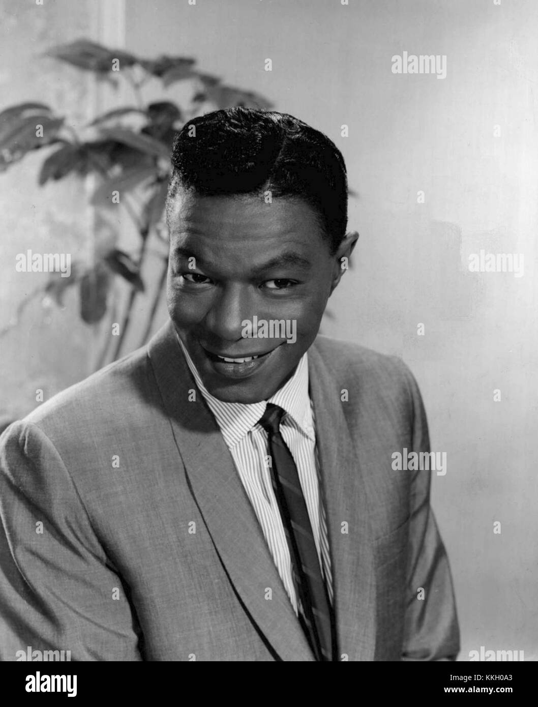Nat King Cole, a renowned American jazz musician, singer, and ...