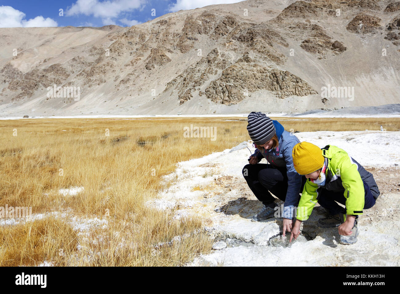 Child touching water hi-res stock photography and images - Alamy