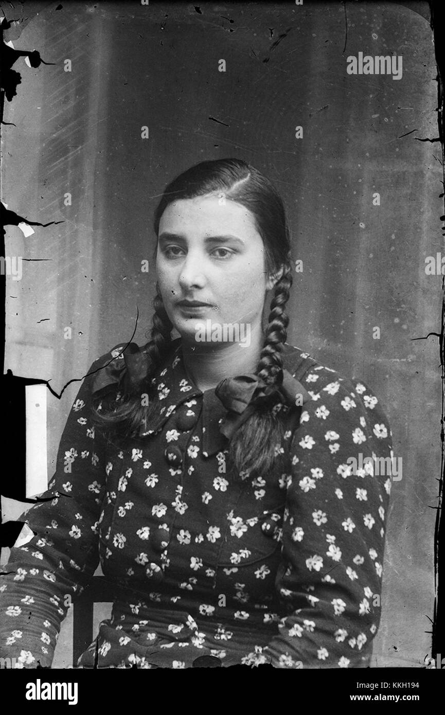 A semi-profile portrait with hair styled in braids taken in California ...