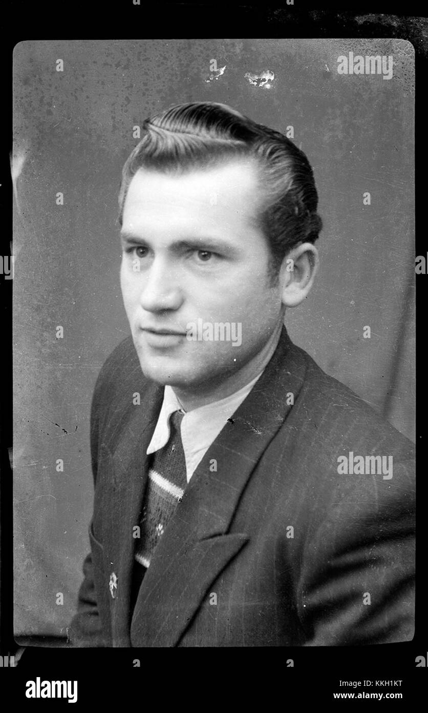 This image shows a semi-profile view of a man in a celluloid portrait ...