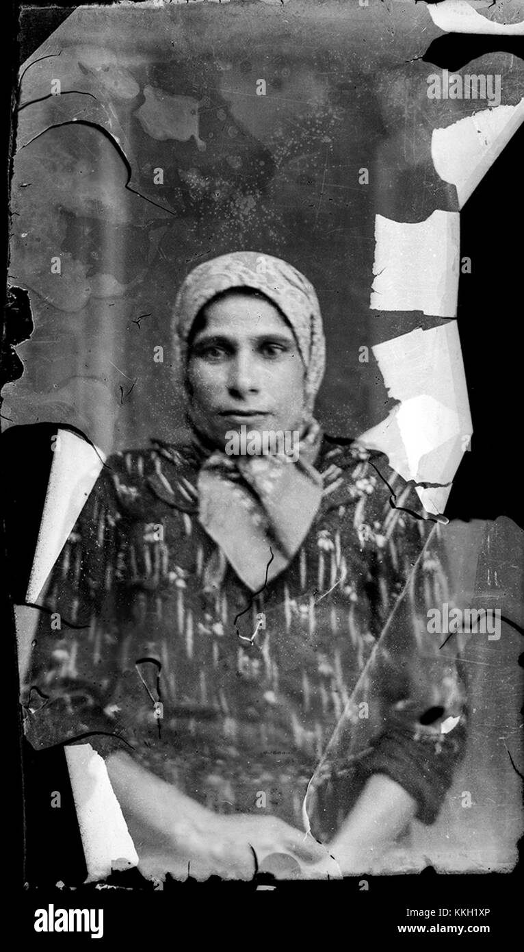 The image 'Femeie cu batic' (Woman with a Headscarf) captured in 2013 ...