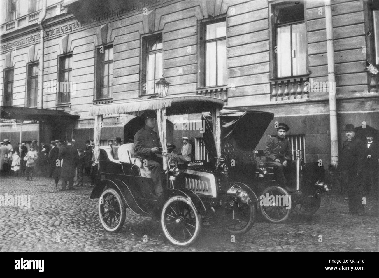 A historic photograph capturing the first taxis operating on the ...