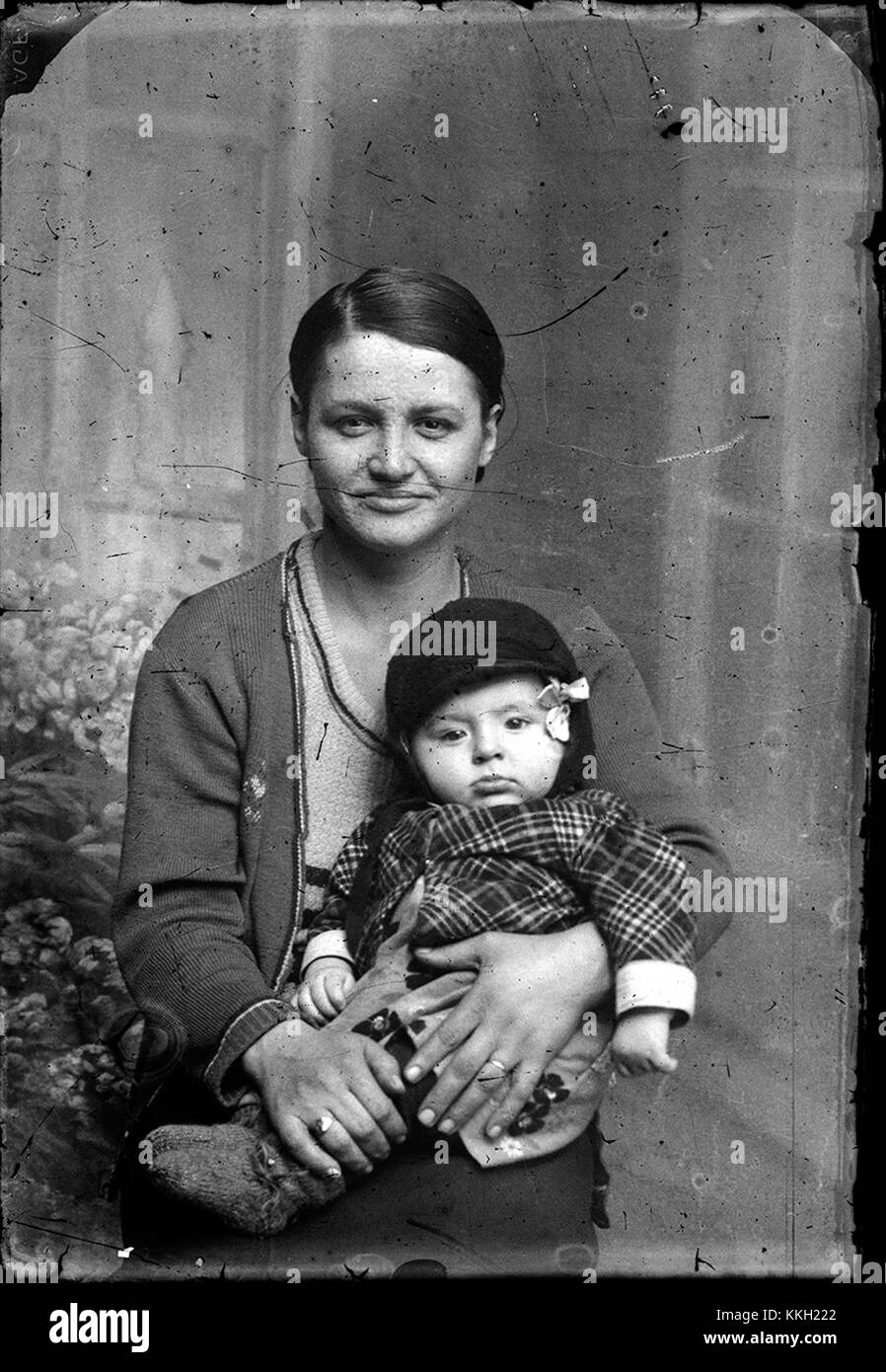 This photograph, titled 'Mama cu copil' (Mother with Child), was taken ...