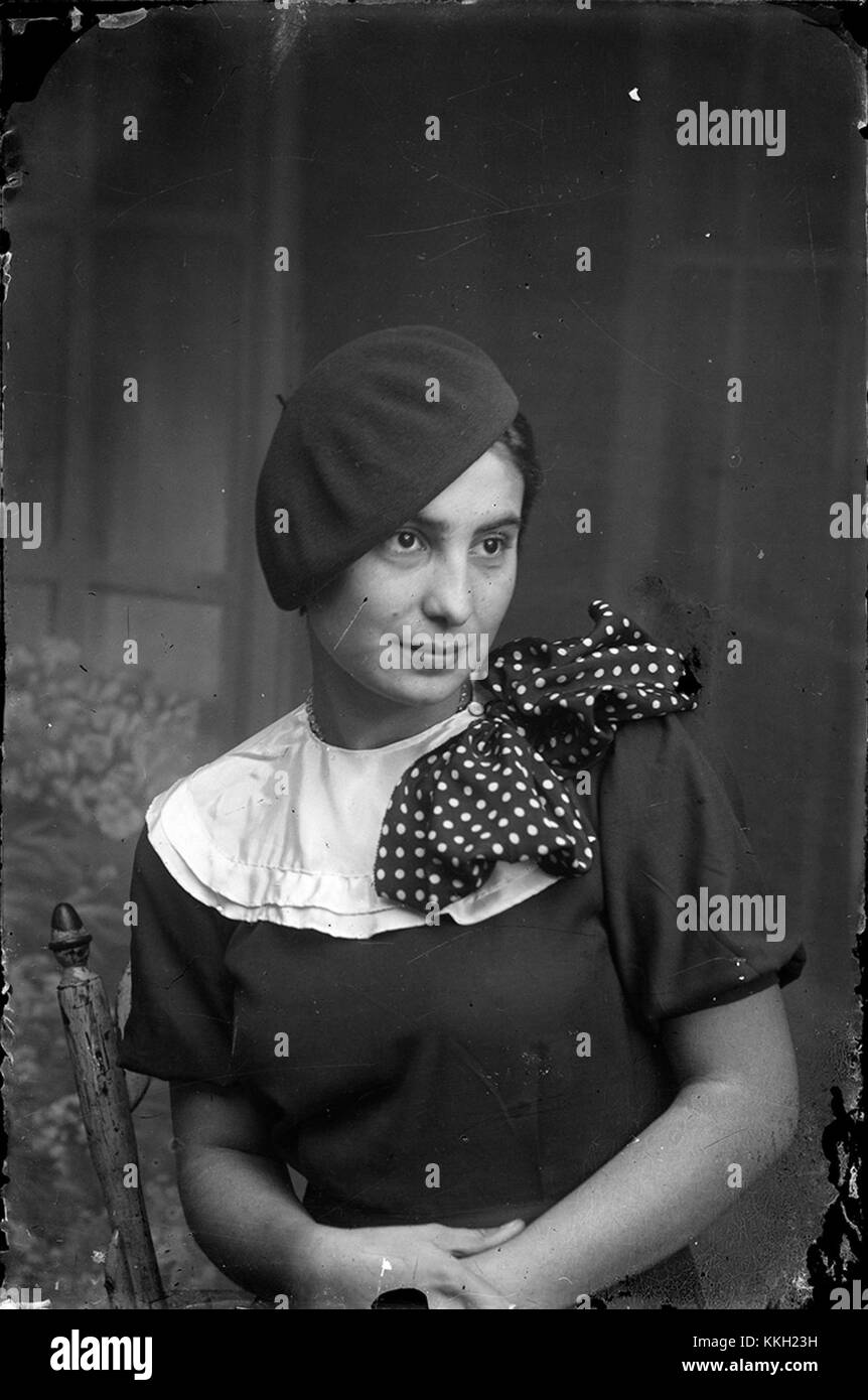 The image titled 'Femeie cu bereta È™i pampon' from 2013 features a ...