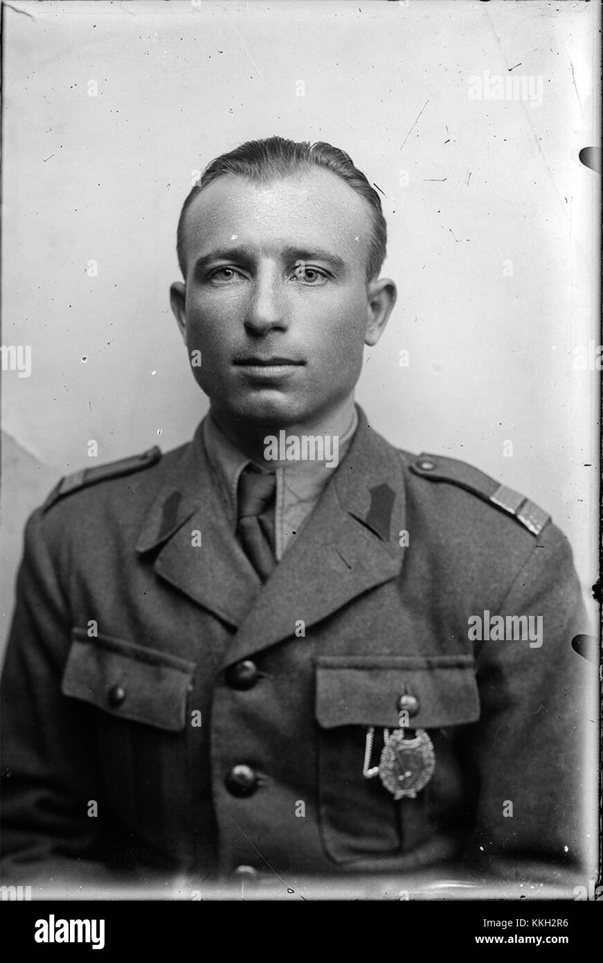 The image depicts two soldiers from a military context, captured in ...