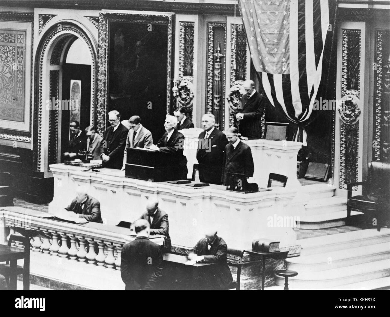 Chaplain Couden offers a prayer, a moment captured in time highlighting ...