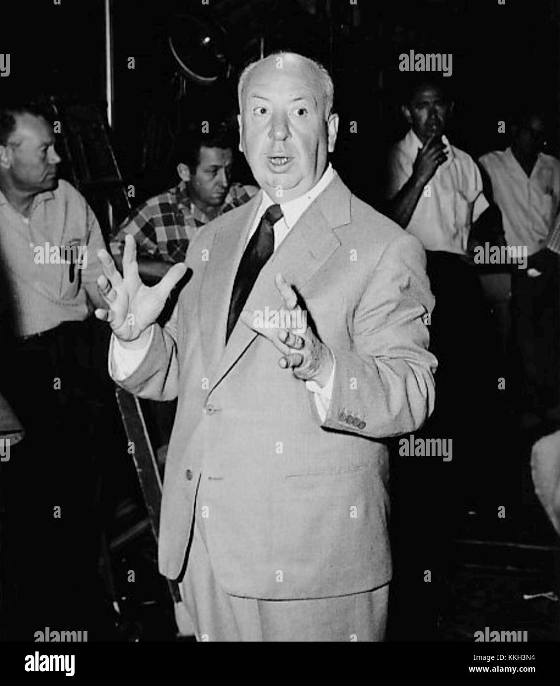 A portrait of legendary filmmaker Alfred Hitchcock from 1955, known for ...