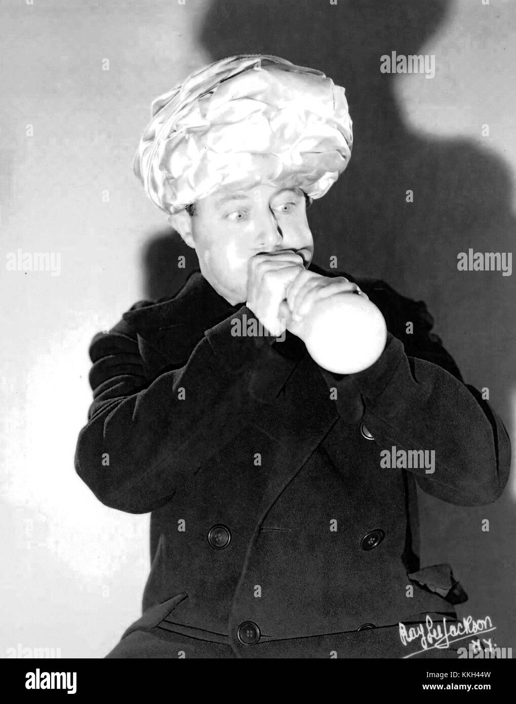 This image features Joe Cook, a well-known performer from the 1930s ...