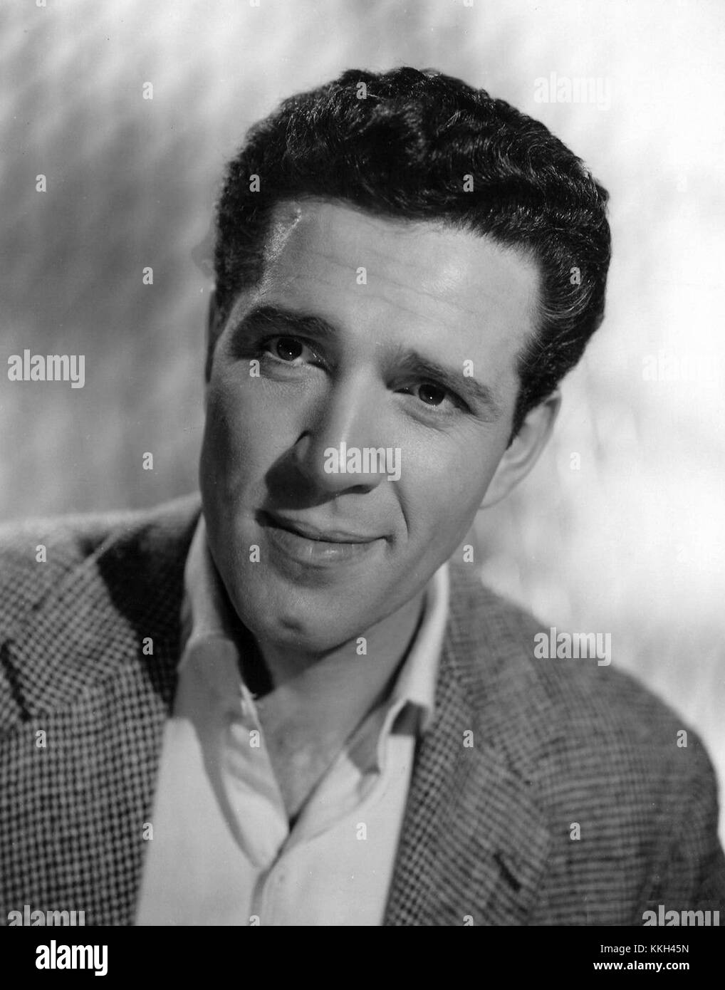 Kieron Moore, a well-known British actor, is featured in this image ...