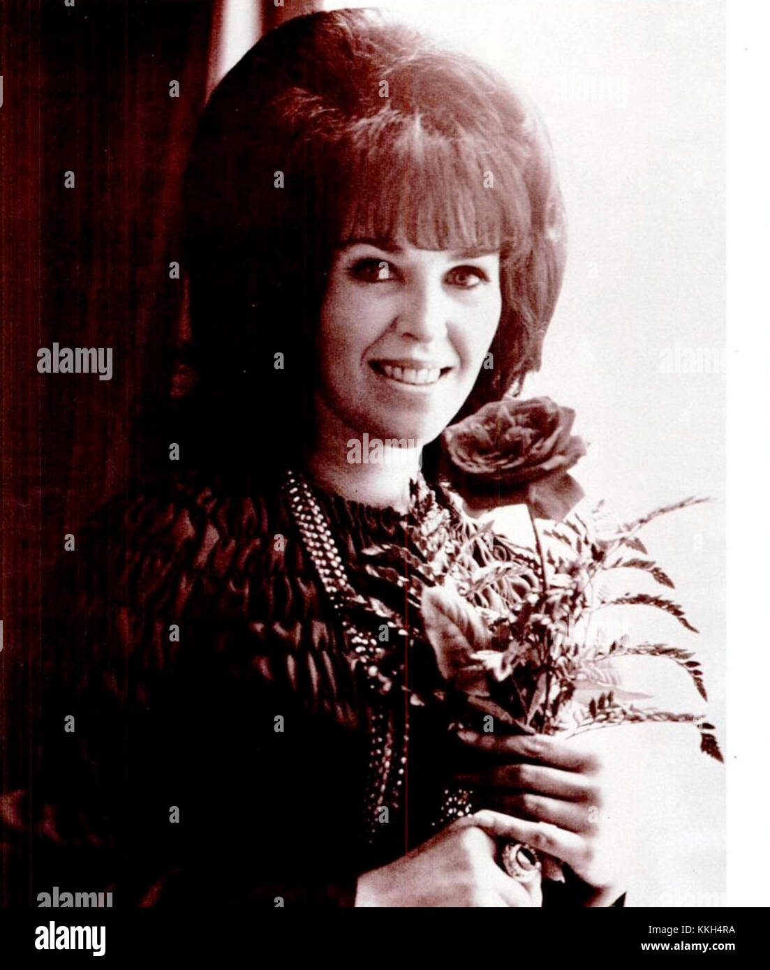 This image captures Wanda Jackson, a famous American singer and ...