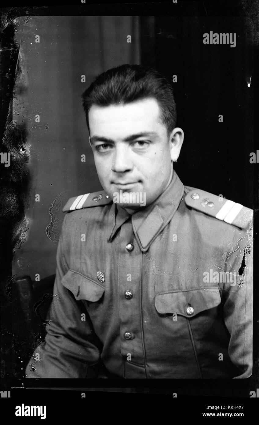 The image features a plan film showing a military scene, potentially ...