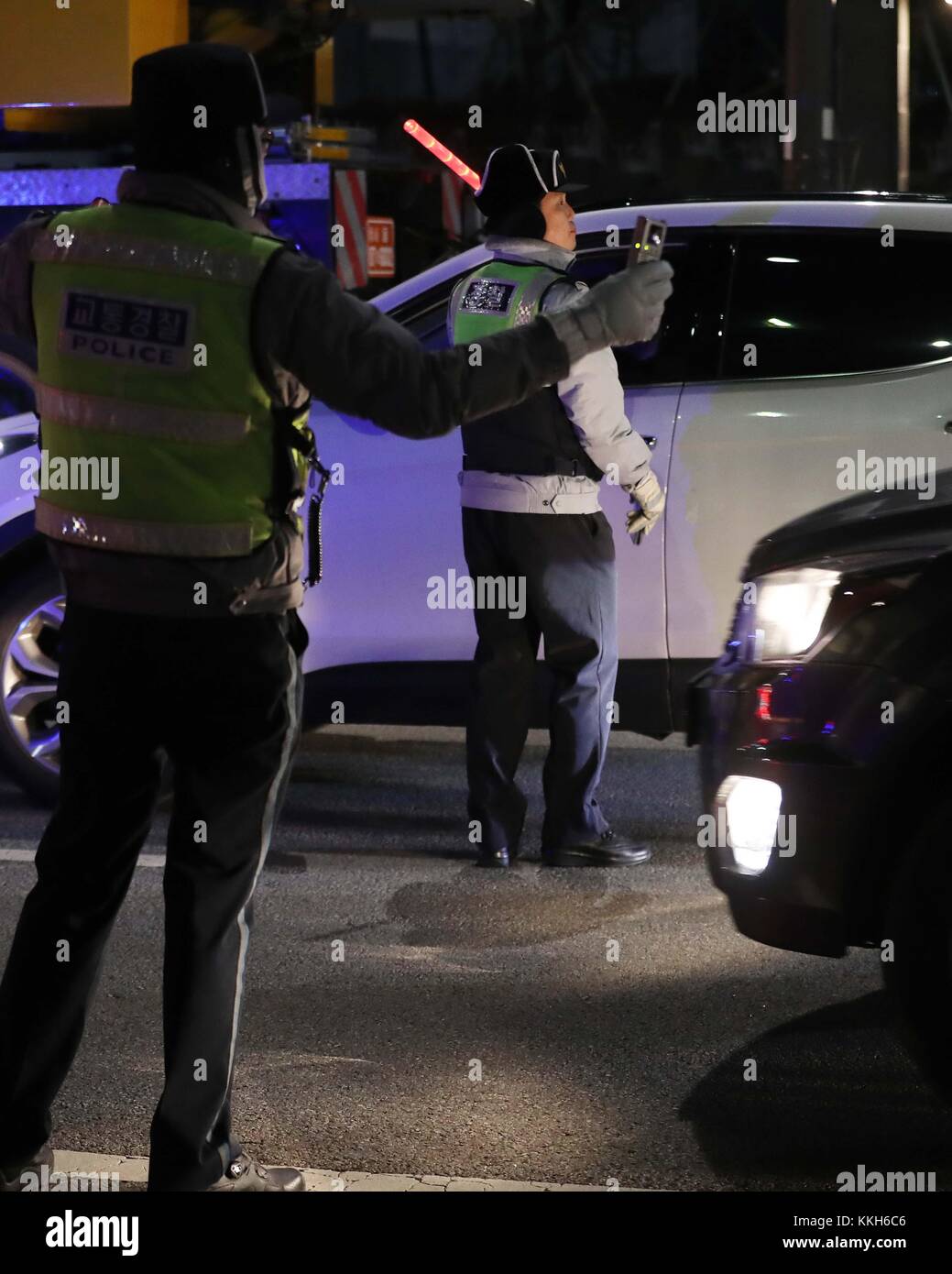01st Dec, 2017. Crackdown on drunk driving Police officers check for ...
