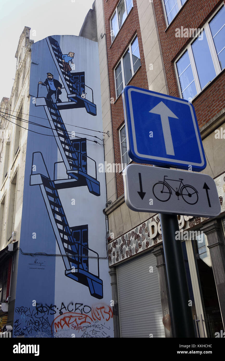 A street art cartoon with Tim, Struppi and Captain Haddock on a fire ...