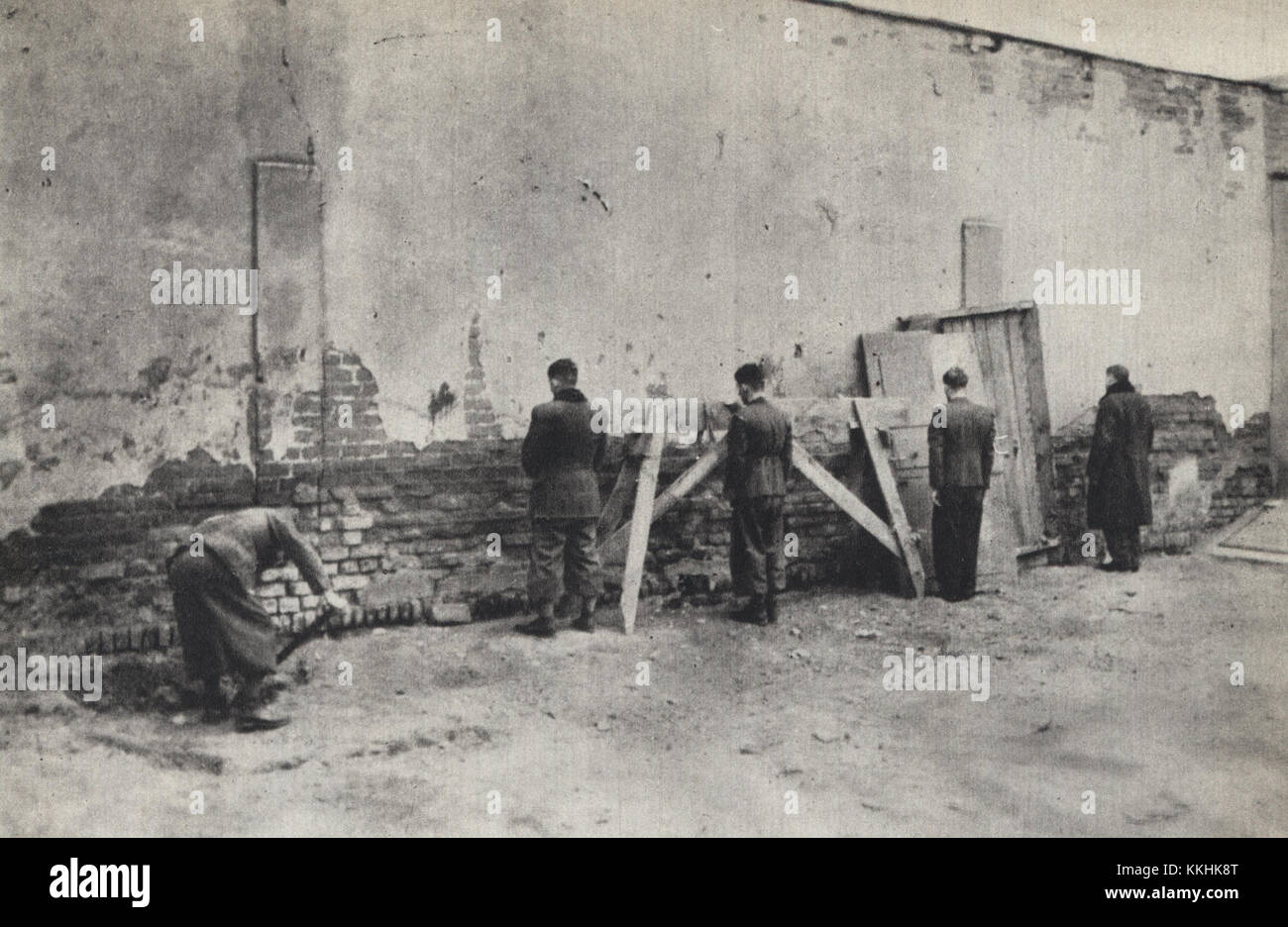 This historical photograph depicts the tragic execution of Polish ...