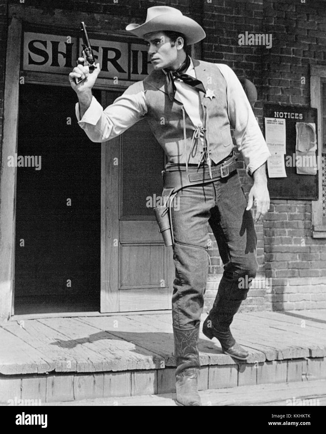 A vintage photograph of Clint Walker, an American actor, portraying a ...