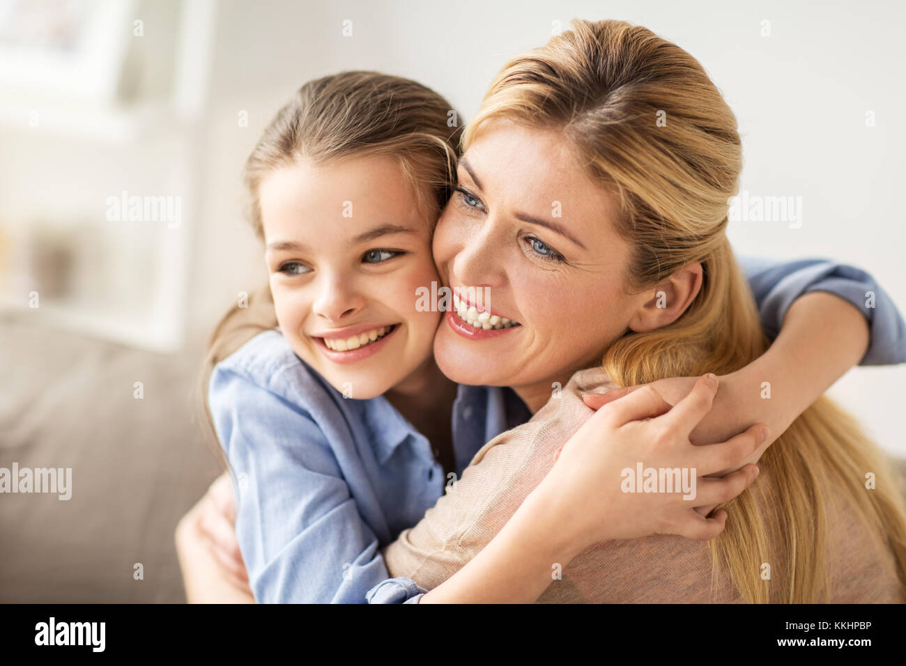 Teenager hugging family hi-res stock photography and images - Alamy