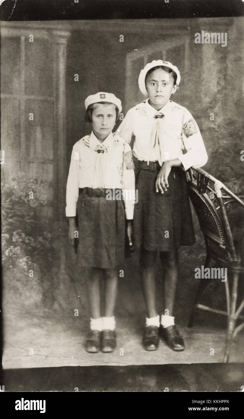 A photograph showing two girls dressed in traditional shepherd costumes ...