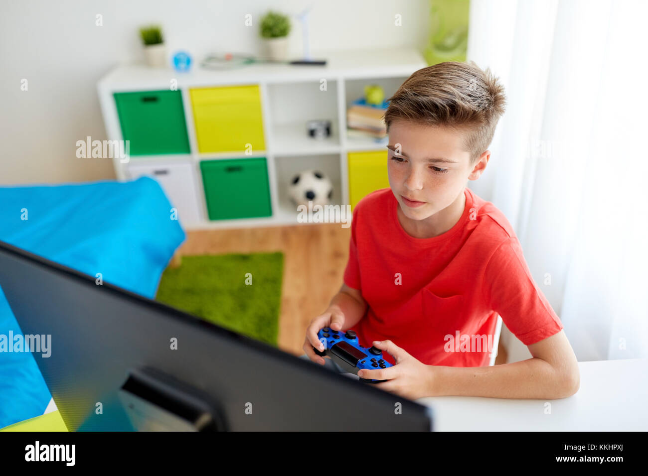 Child playing with computer table hi-res stock photography and images ...