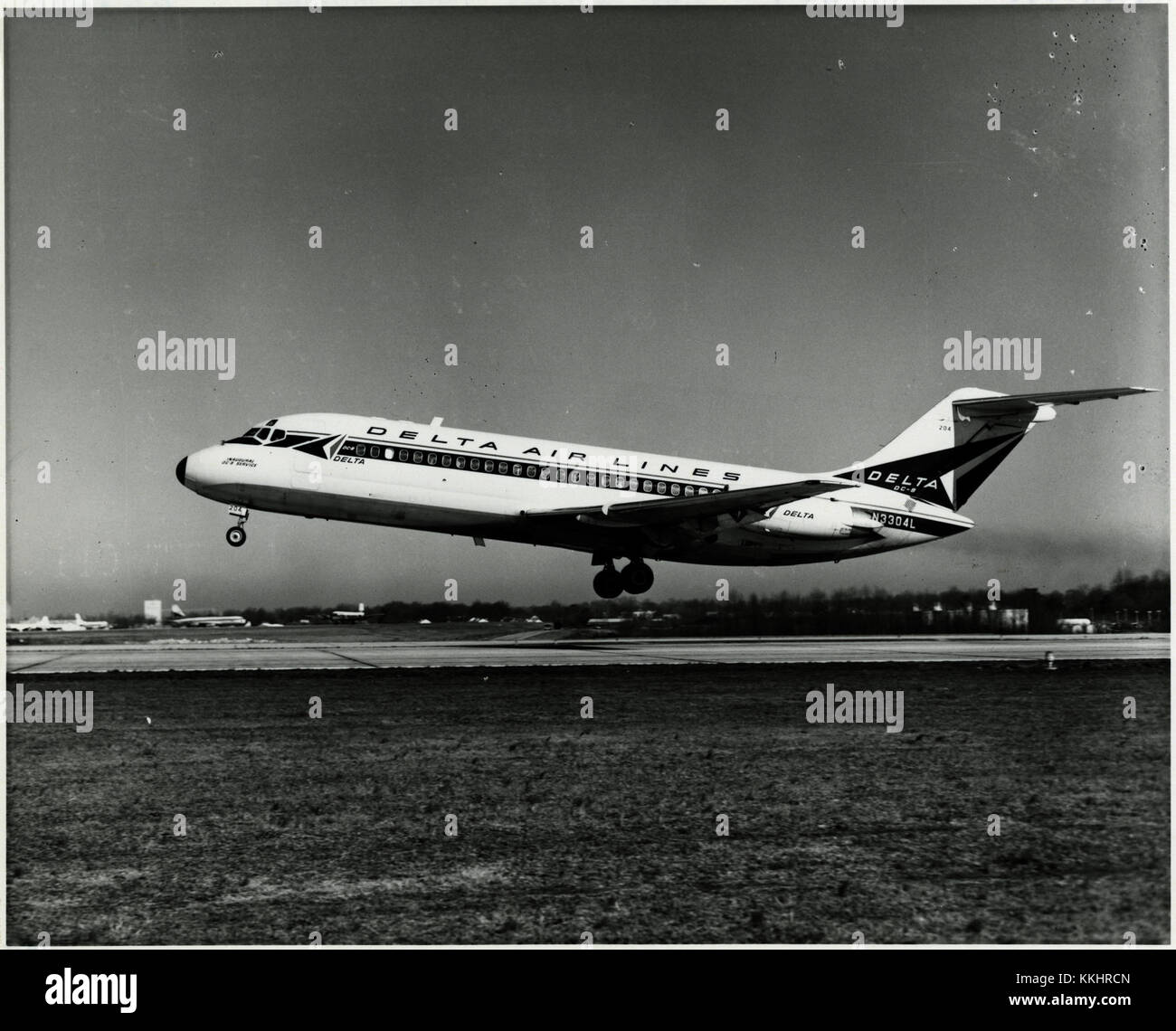 This 1965 image shows a left-side view of the Delta Air Lines Douglas ...