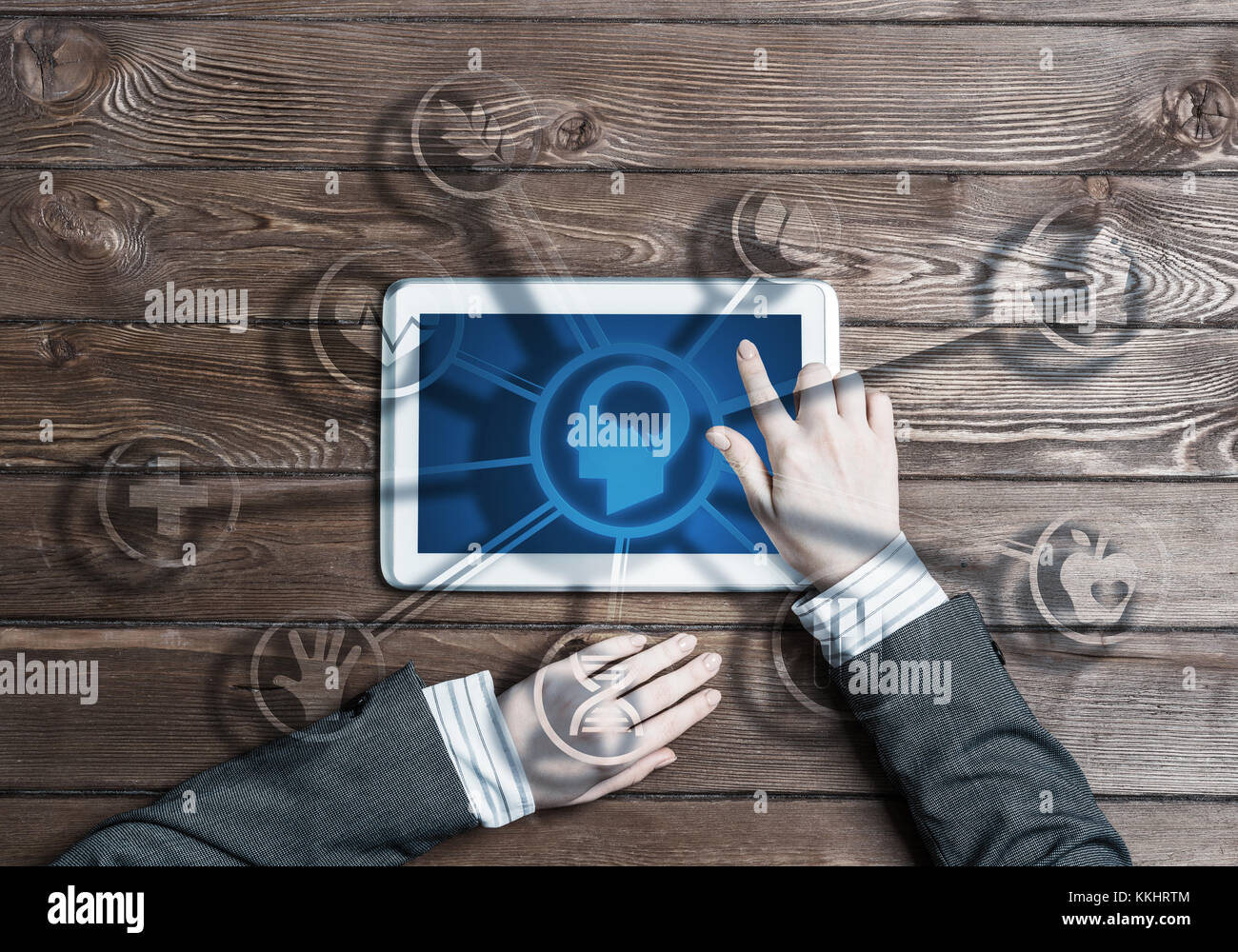 Business workplace with tablet device in female hands and media user ...