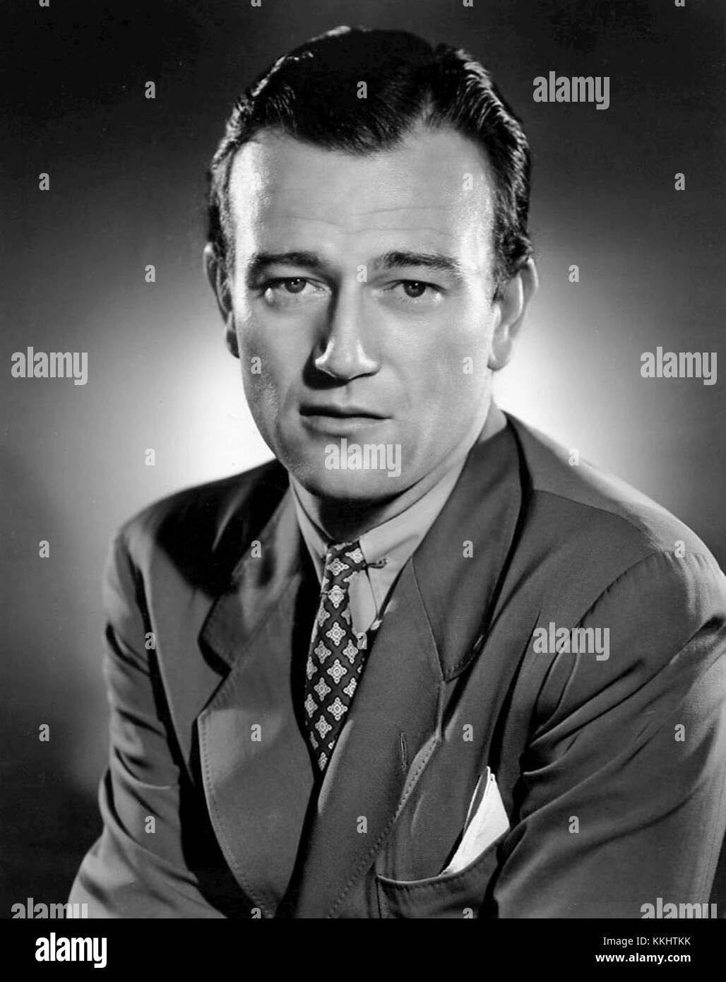 This image features John Wayne, the iconic American actor known for his ...