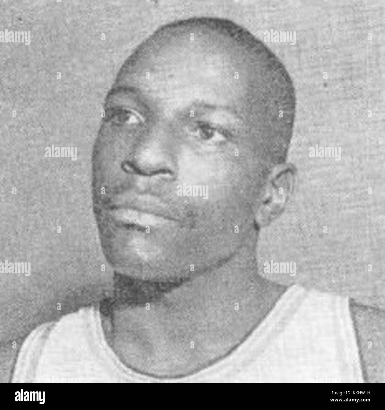 This photograph features Andy Johnson, a basketball player, capturing a ...