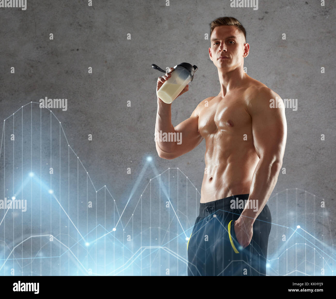 young man or bodybuilder with protein shake bottle Stock Photo - Alamy