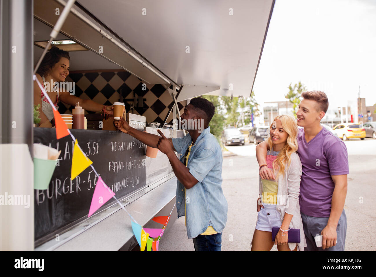 happy customers queue at food truck Stock Photo - Alamy