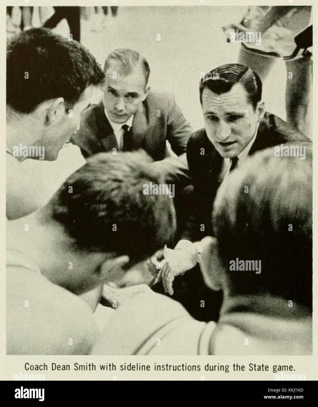 Dean Smith, photographed in 1964, was a prominent figure in basketball ...