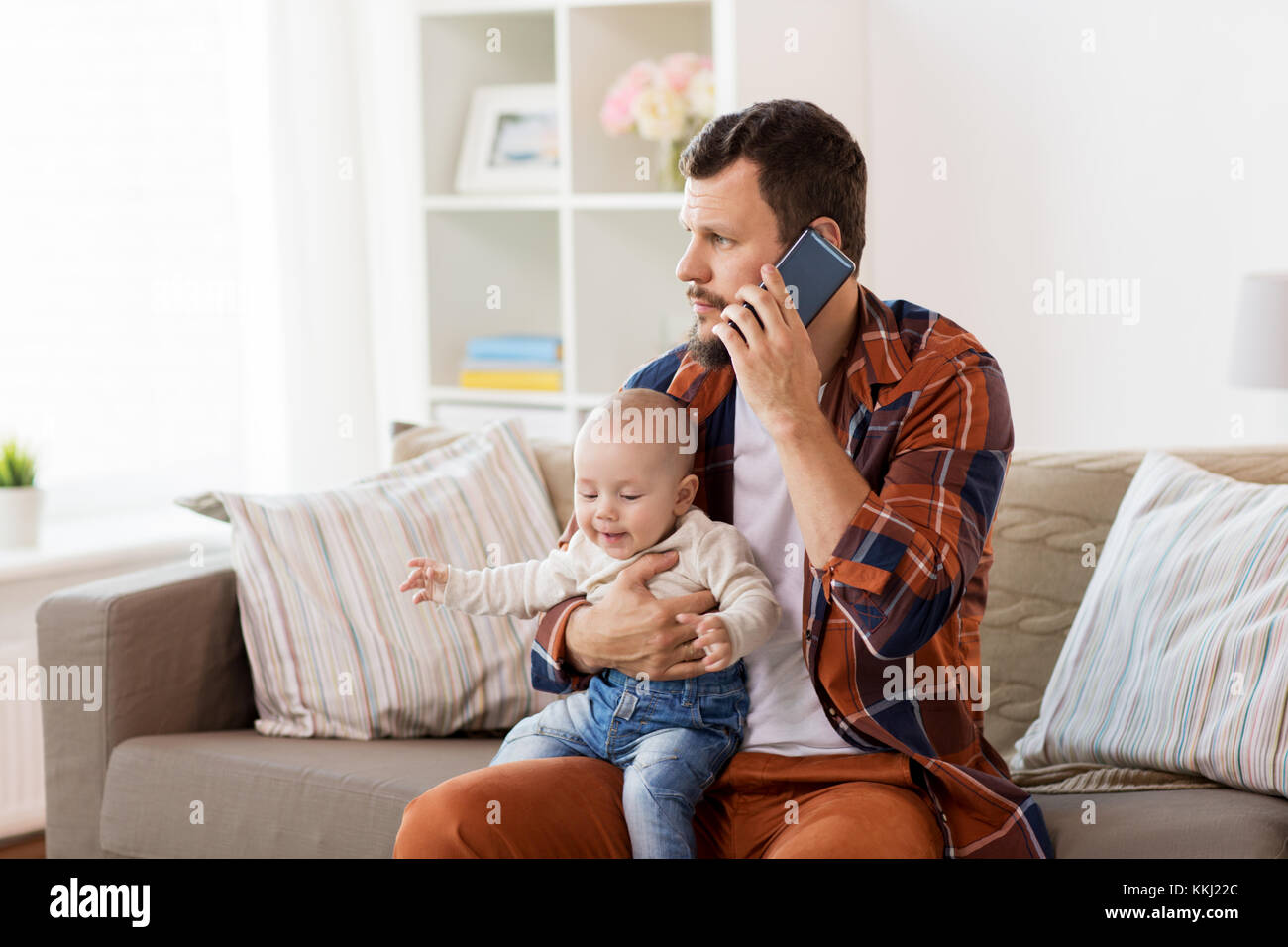 Father calling mobile phone family hi-res stock photography and images ...