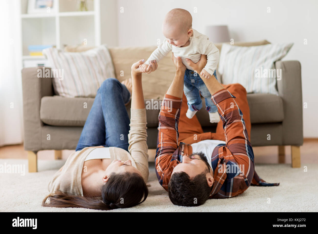 happy family playing with baby at home Stock Photo - Alamy