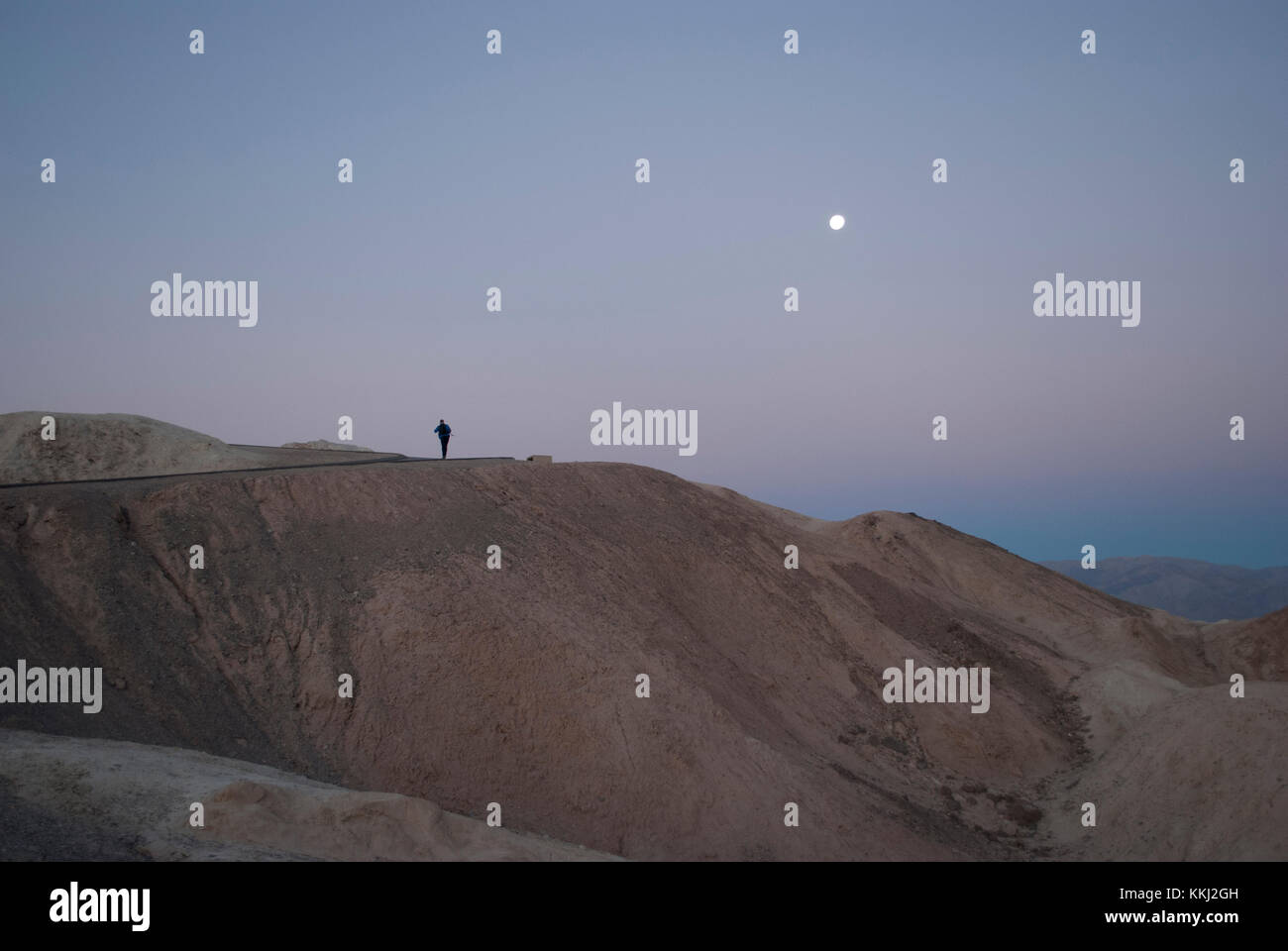 Mountain landscape at night with the man climbing a mountain Stock ...