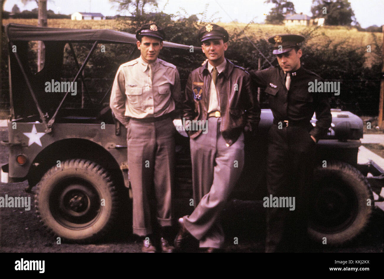This photograph depicts three airmen from the 322nd Bombardment Group ...