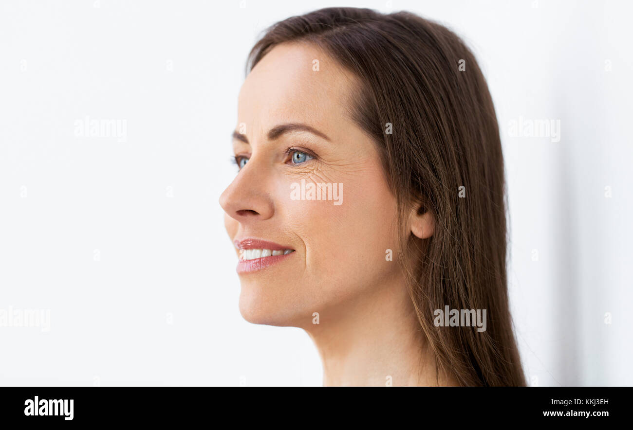 face of happy smiling middle aged woman Stock Photo - Alamy